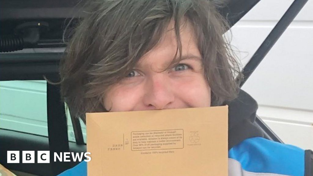 Adorable DEMONZ: Singer Lewis Bootle performs while making deliveries