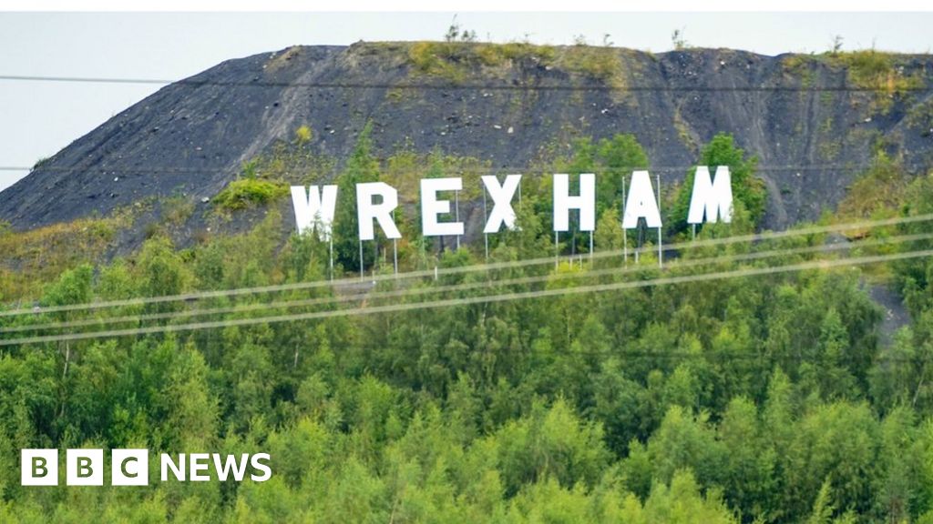 Wrexham: Giant Hollywood-style sign was van-hire firm PR stunt - BBC News