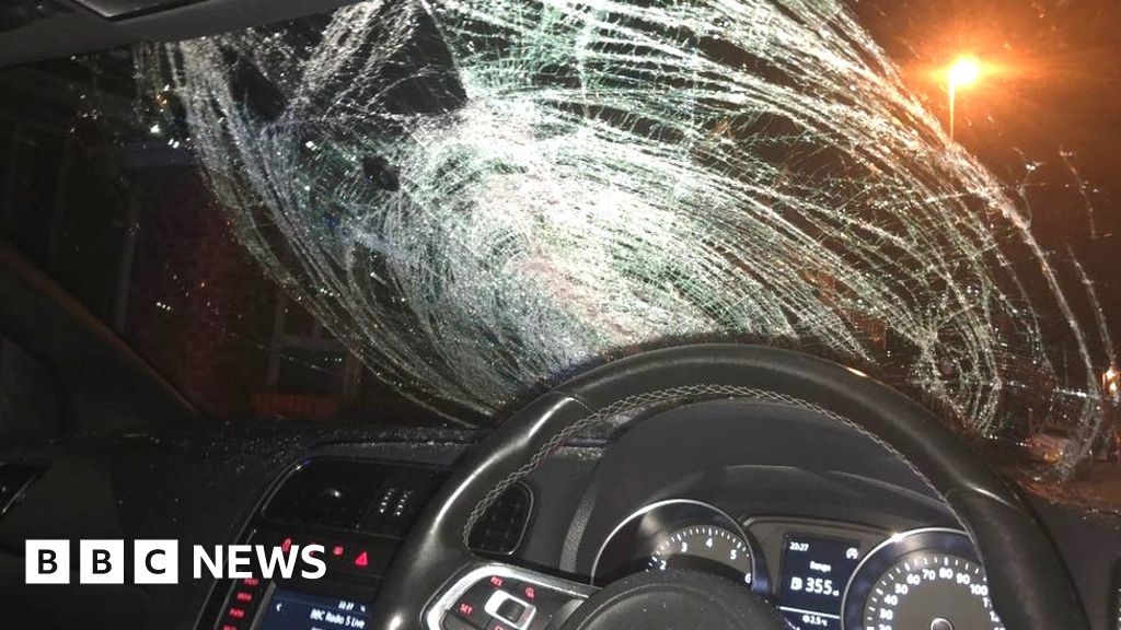 Man pulled over for driving with shattered windscreen - BBC News