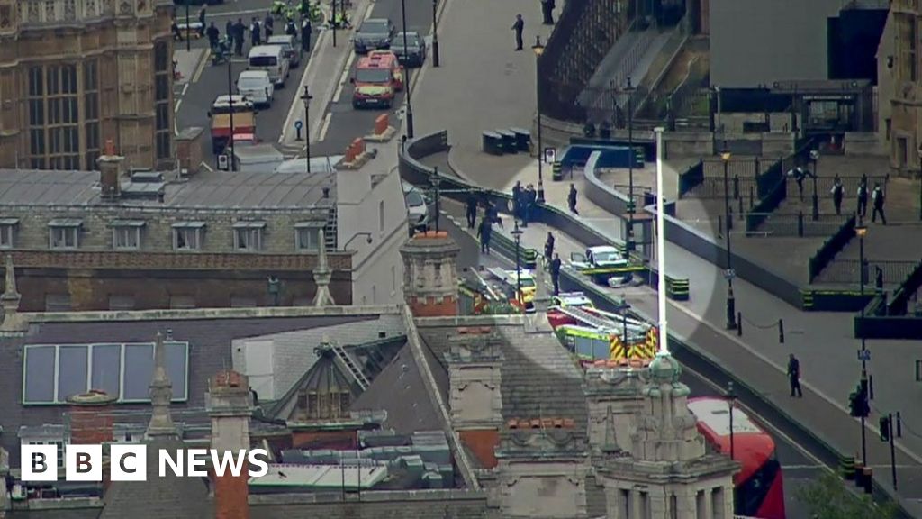 Watch: Moment car crashes into Parliament - BBC News