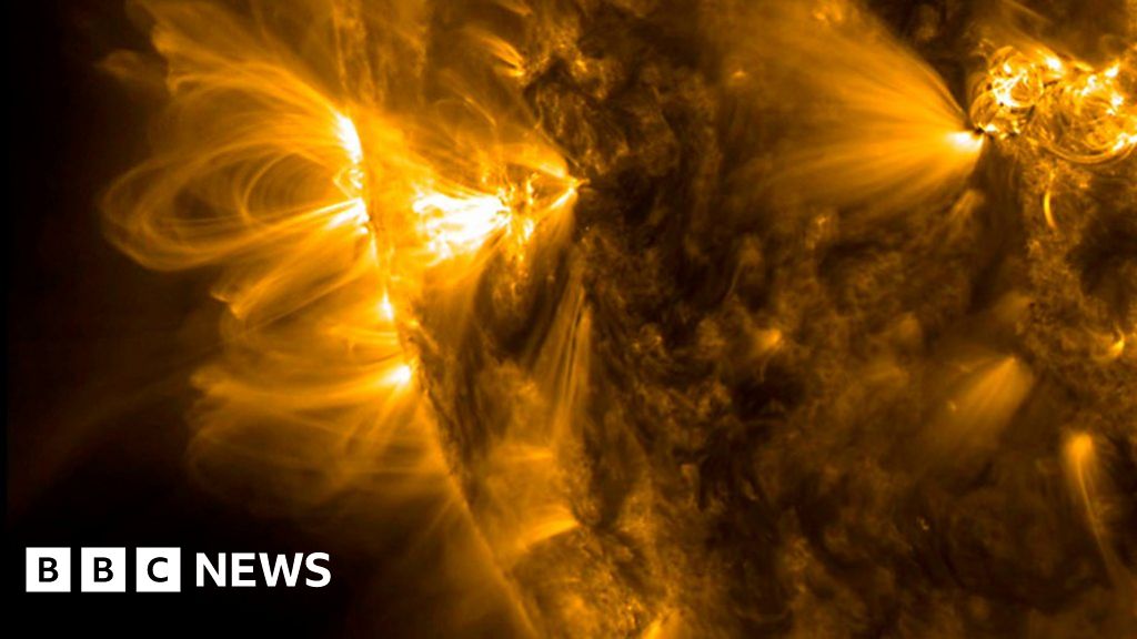 Nasa videos loops coming out of the sun... - BBC News