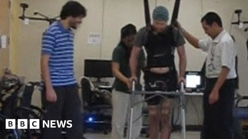 Paraplegic man walks after spine 'bypass' - BBC News