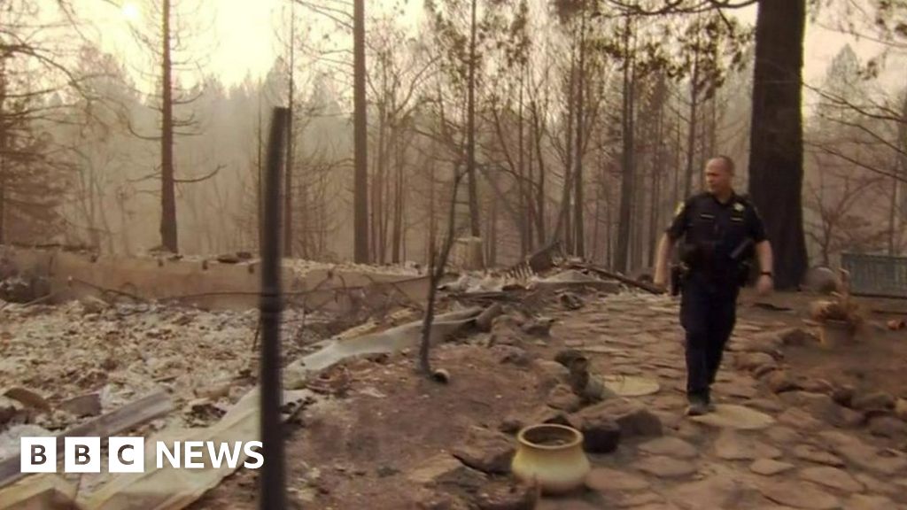 California wildfire destroys police officer's home - BBC News