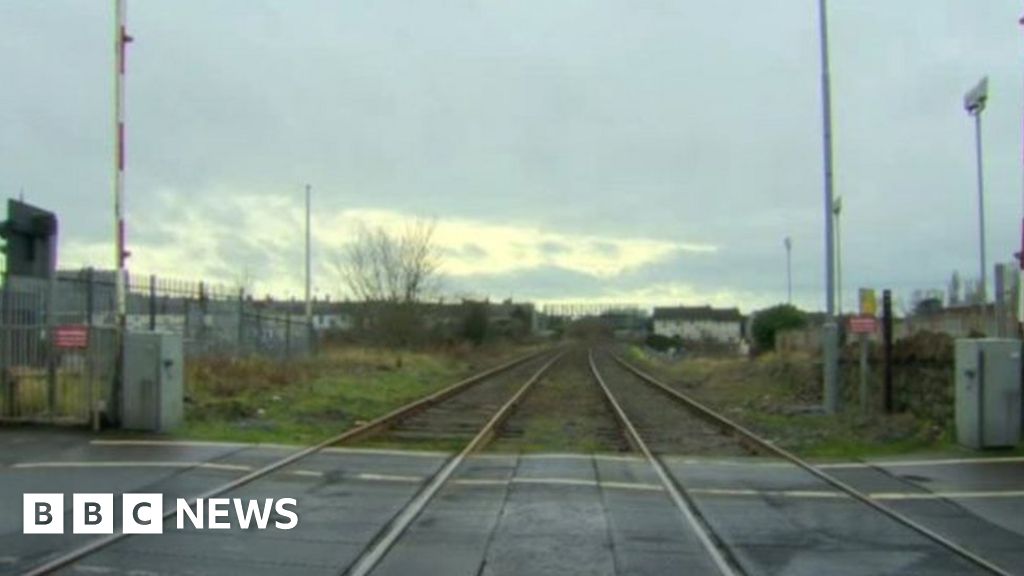 Lurgan, County Armagh: Petrol bombs thrown and van hijacked and set on ...