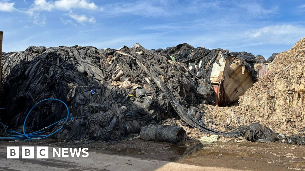 Crews to monitor large Colwick waste fire through the night - BBC News