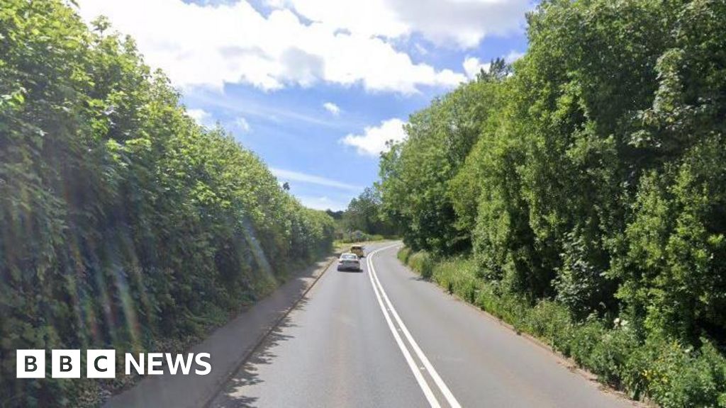 Police close A381 after vehicle overturns in crash - BBC News