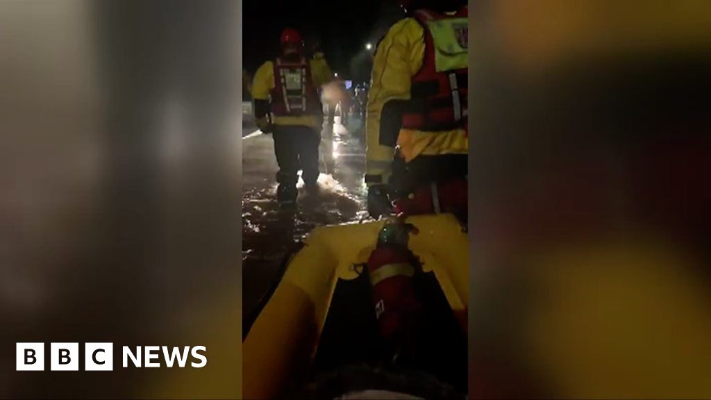 Flood rescue: Welsh fire crews ferry family to safety