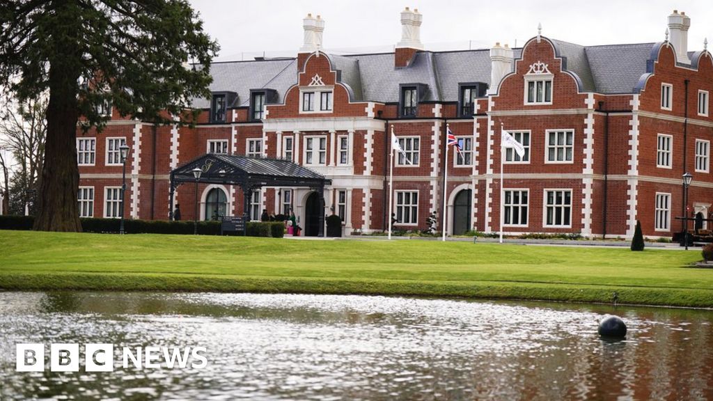 Tory donor told to demolish five-star hotel wing in Egham - BBC News