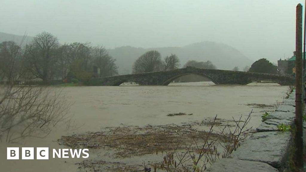 Wales suffers floods and power cuts as wind and rain hits - BBC News