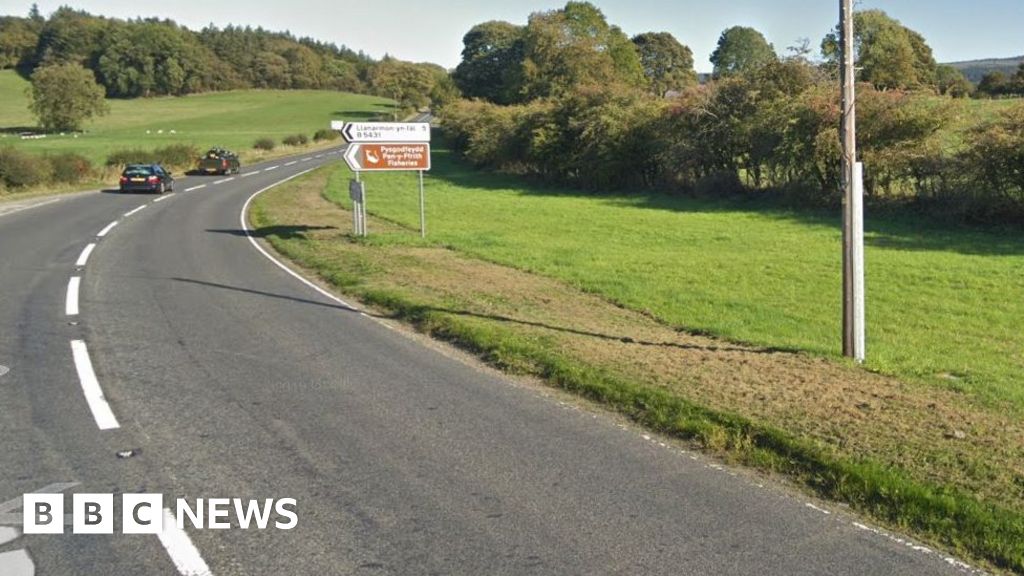 Biker dead after combine harvester crash near Ruthin - BBC News