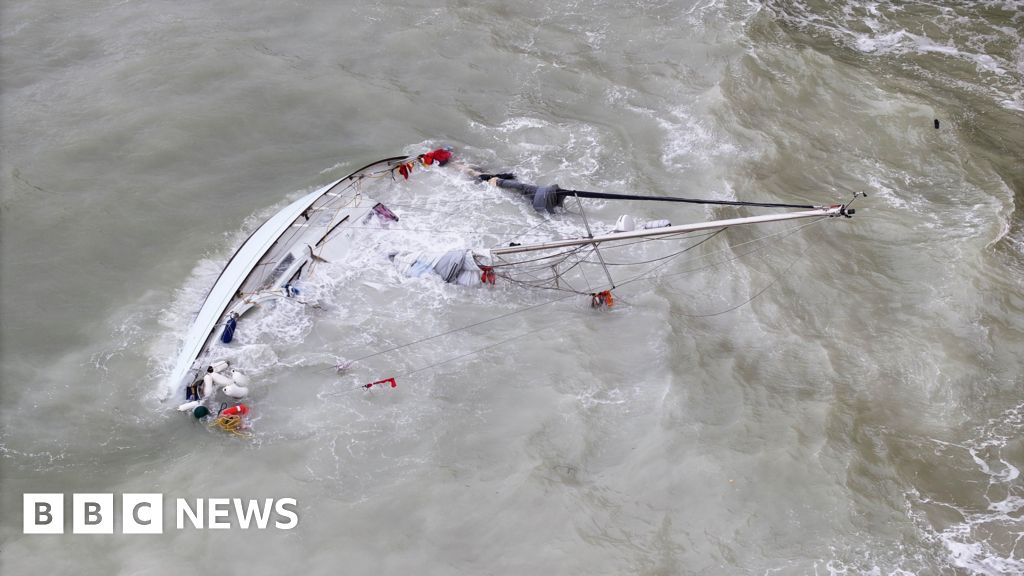 Seaford: Two people rescued after yacht runs aground - BBC News