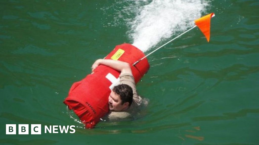 Robot lifeguard EMILY starts work at Shell Island - BBC News