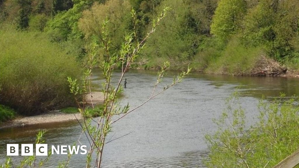 Boy rescued from river during 'warm weather' swim - BBC News