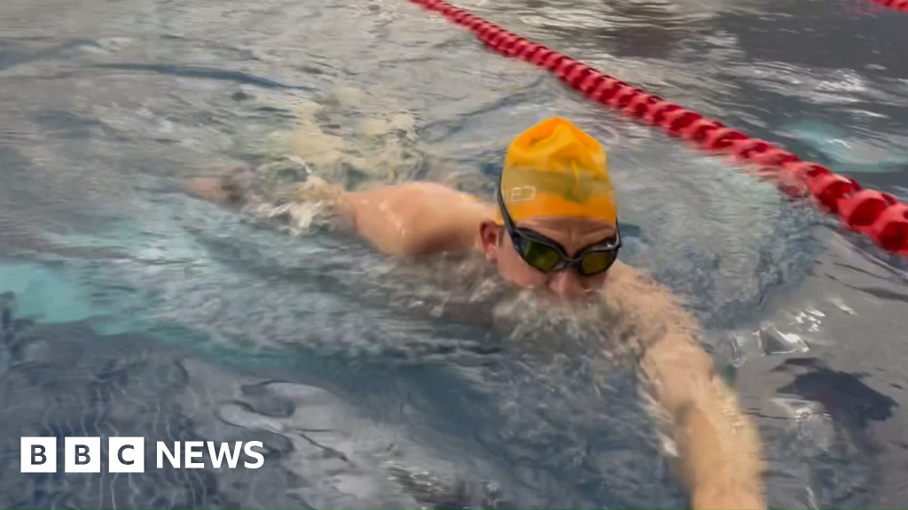 Dudley: Swimmers complete fundraising relay in memory of Iain Hughes ...