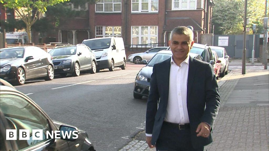 London Mayor Sadiq Khan heads to first day in office - BBC News
