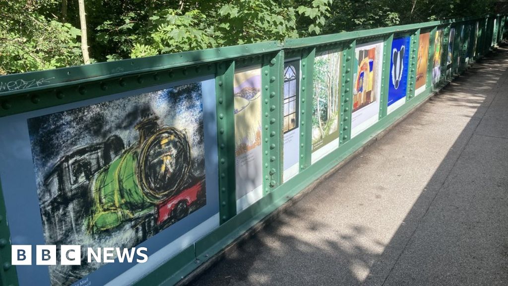 Hailsham: Community covers graffiti on bridge with residents' art - BBC ...
