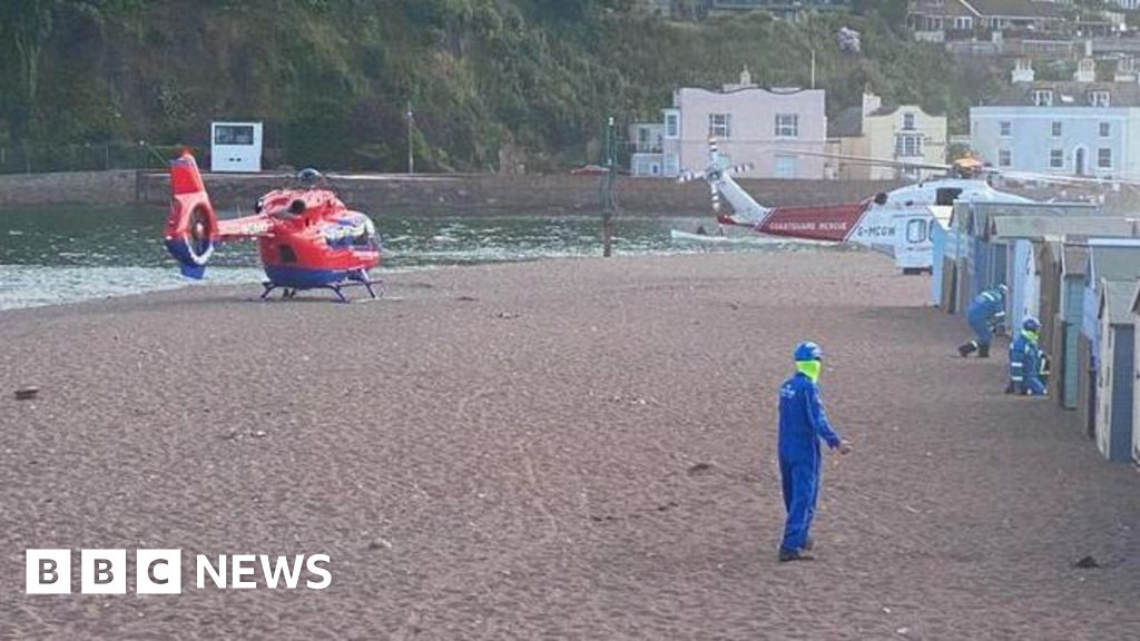 Unconscious free-diver rescued and taken to hospital - BBC News