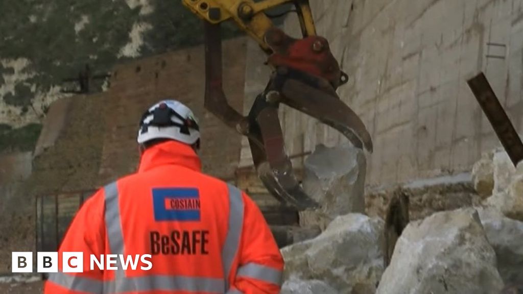Rail line reopening date unknown after Dover sea wall damage - BBC News