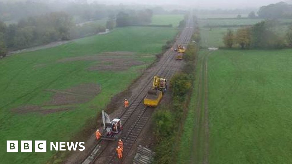 Trains return to flood-damaged Abergavenny to Hereford railway - BBC News