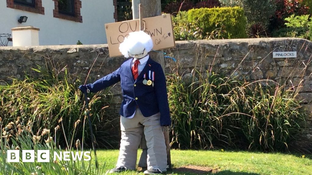 Coronavirus: Cromhall scarecrows celebrate Captain Tom and NHS - BBC News