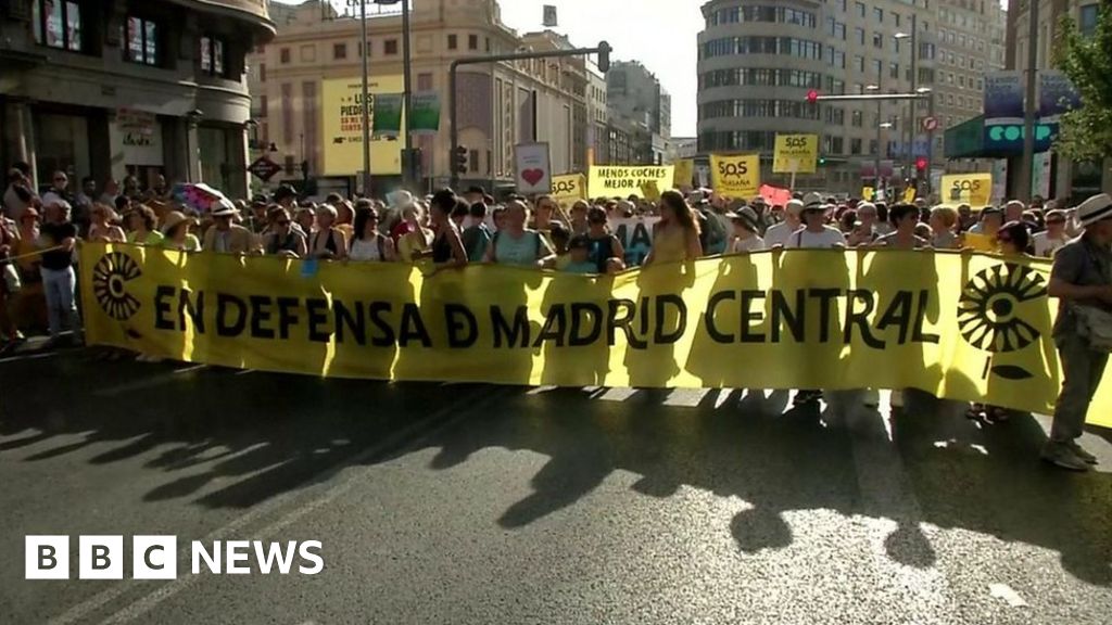 Madrid protests: Thousands rally for anti-pollution car restrictions ...