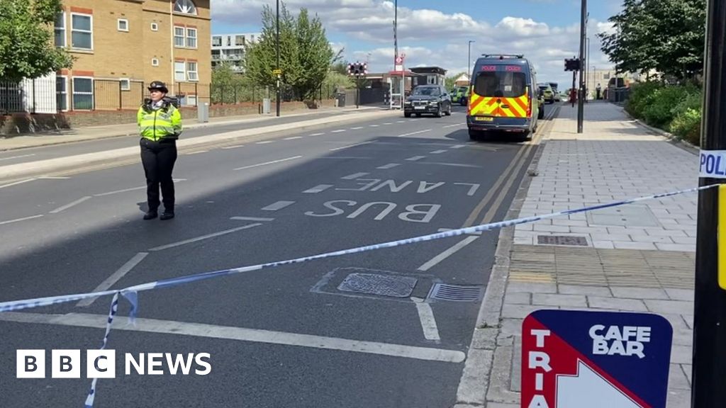 Man shot by armed police on bridge detained as investigation continues