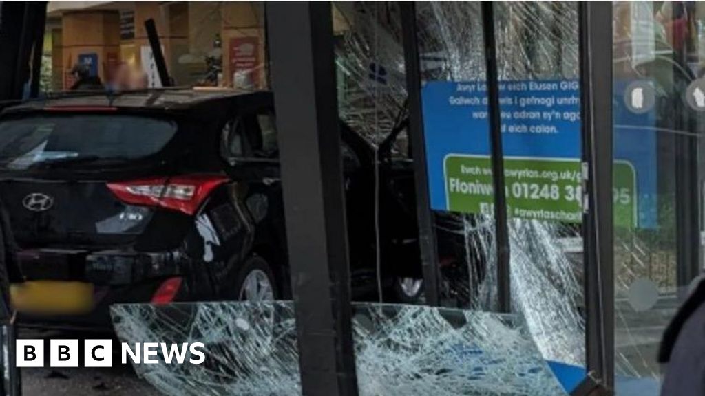 Wrexham Maelor Hospital: One injured as car crashes through doors