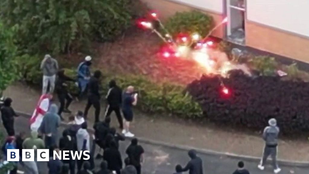 Asylum seeker at targeted Holiday Inn 'thought he would die' - BBC News