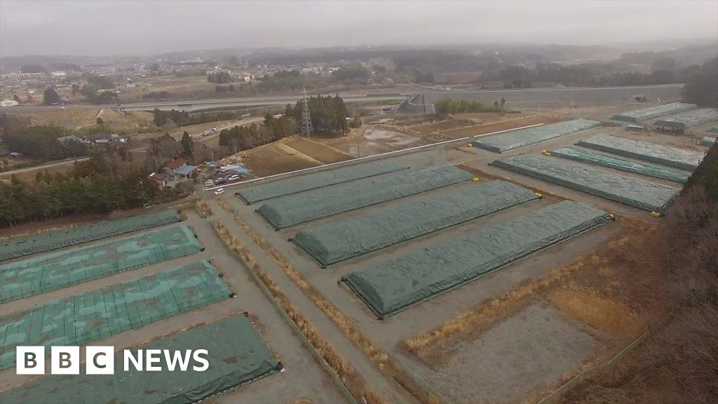 Aerial footage of a Fukushima radioactive waste dump - BBC News