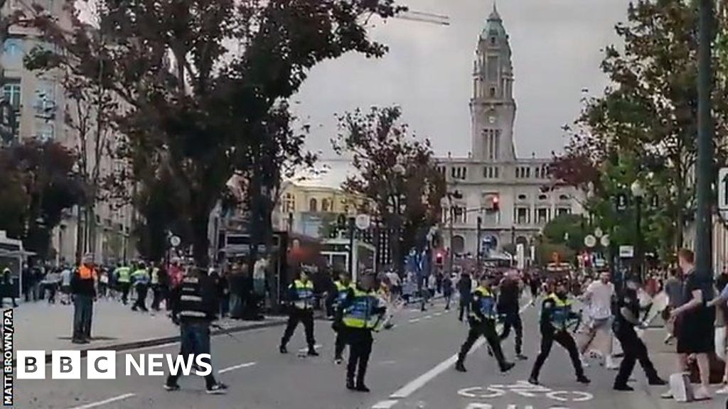 England football fans clash with police in Portugal