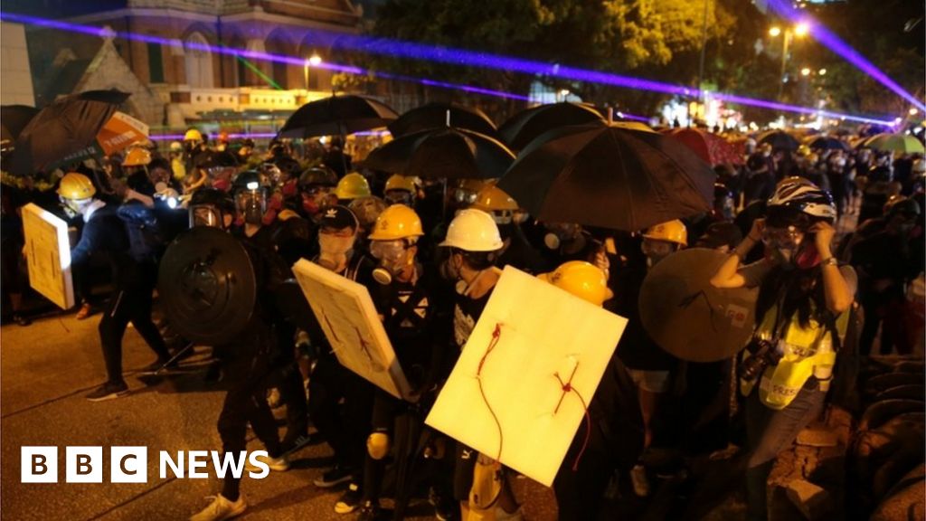 Hong Kong protests: Police fire tear gas at activists - BBC News