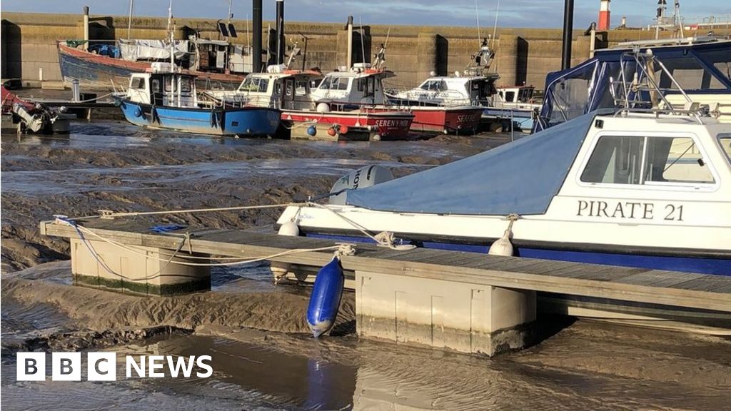 Row erupts over dredging of silted up Watchet marina - BBC News
