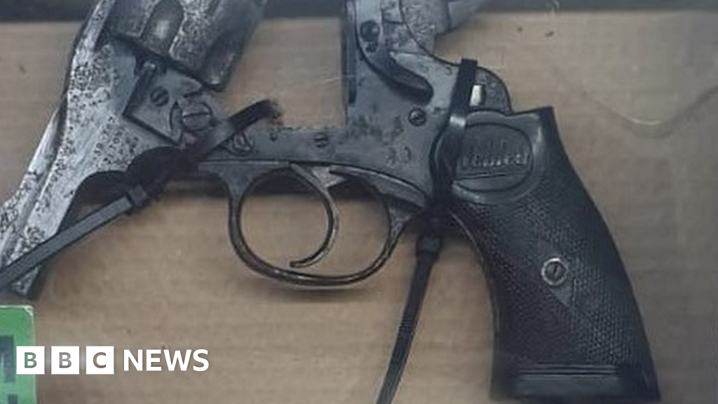 Two men released on bail after firearm found in west Belfast - BBC News