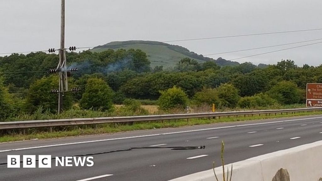 M5 in Somerset reopens 33,000 volt power cable pole catches fire - BBC News