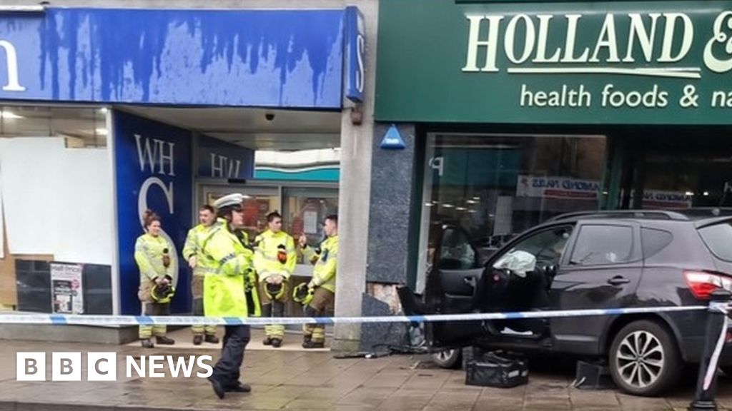 East Grinstead: Car hits pedestrian before crashing into shop