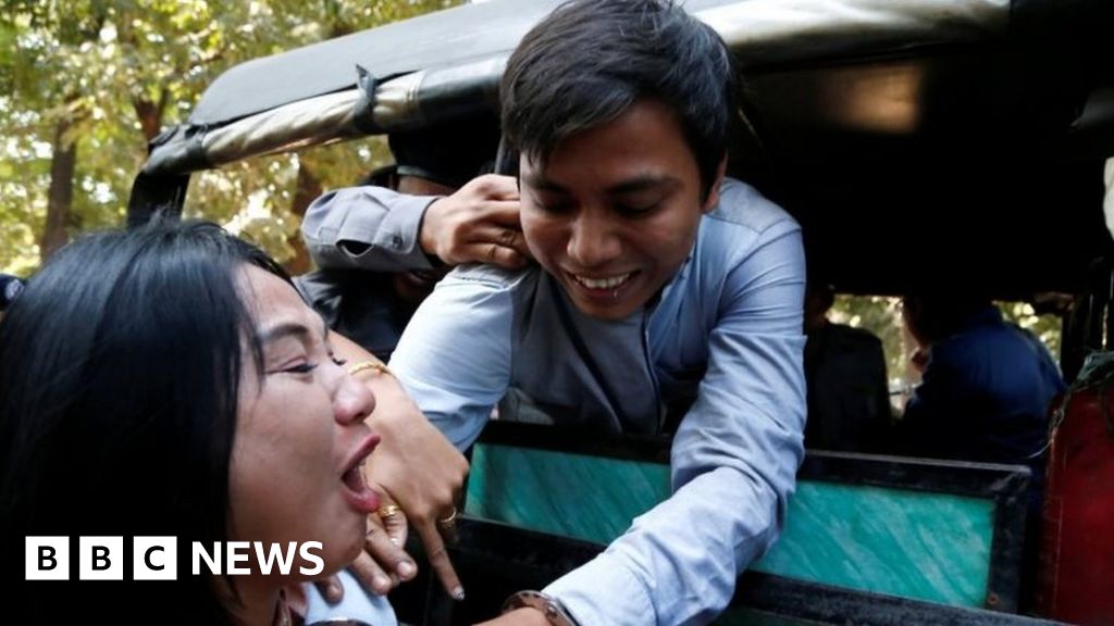 Reuters journalists charged under secrets act in Myanmar - BBC News