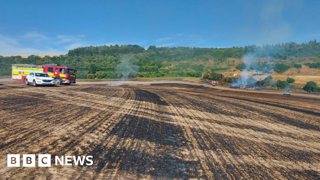 Crews called to field fires during hot weather - BBC News