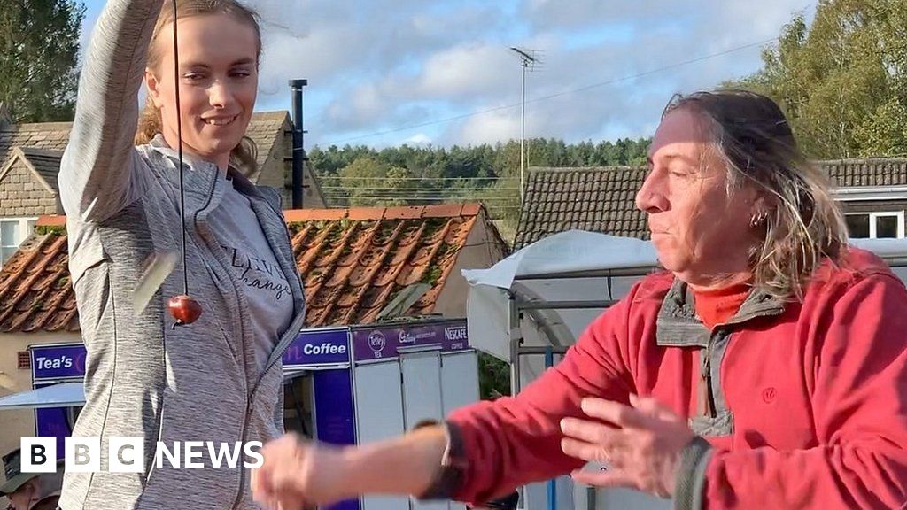 World Conker Championships defies rain to crown a winner - BBC News