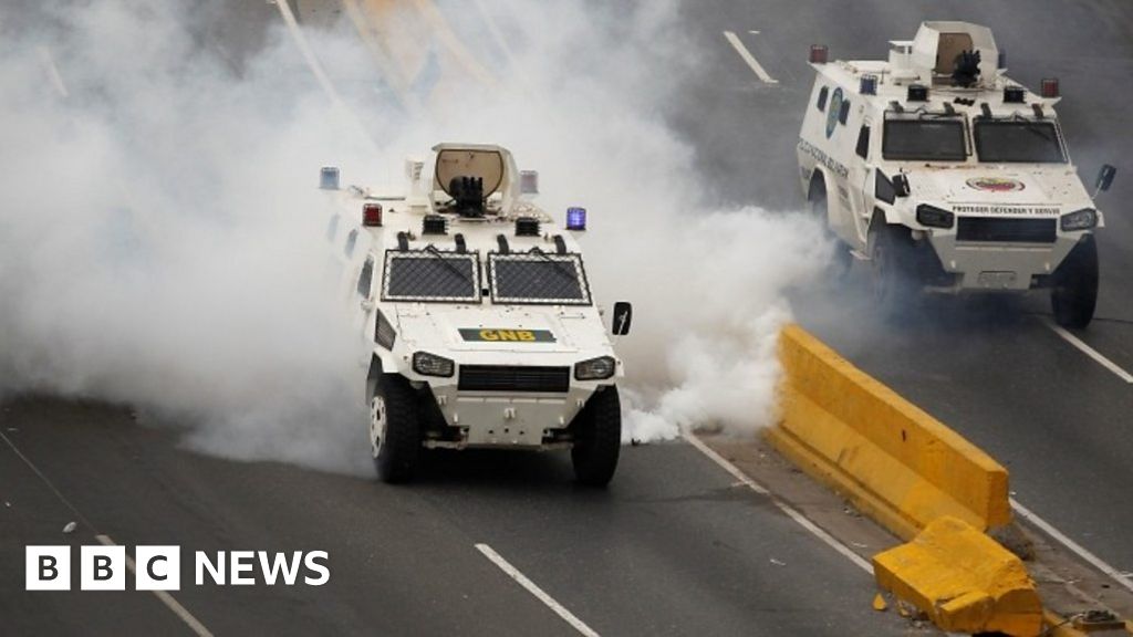 Venezuela crisis: Police fire tear gas as protests continue - BBC News