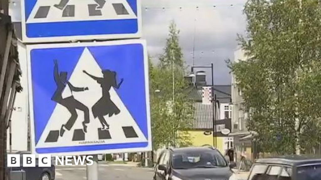 Novelty Swedish street signs get pedestrians dancing - BBC News
