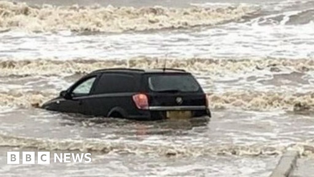 Car stranded on Blackpool beach and submerged by waves