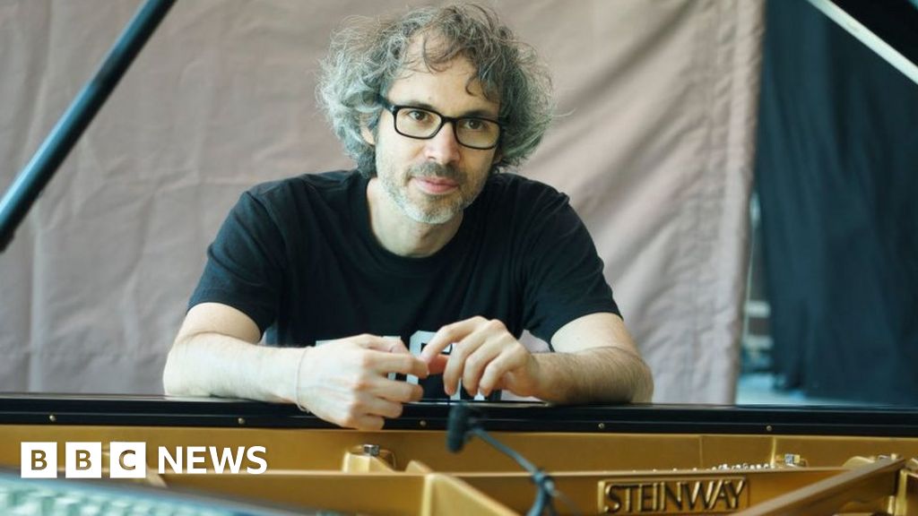 British pianist James Rhodes drives child abuse reform in Spain - BBC News