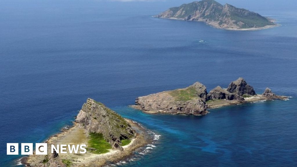 Japan protests to China over ship in disputed waters - BBC News