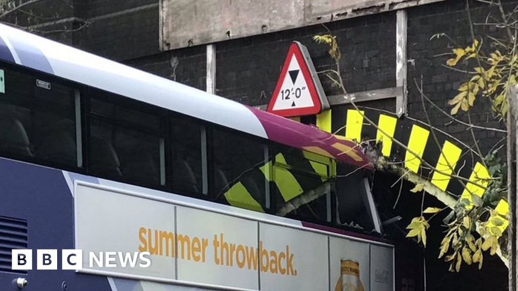 Six hurt as double decker bus hits low bridge in Leicester - BBC News