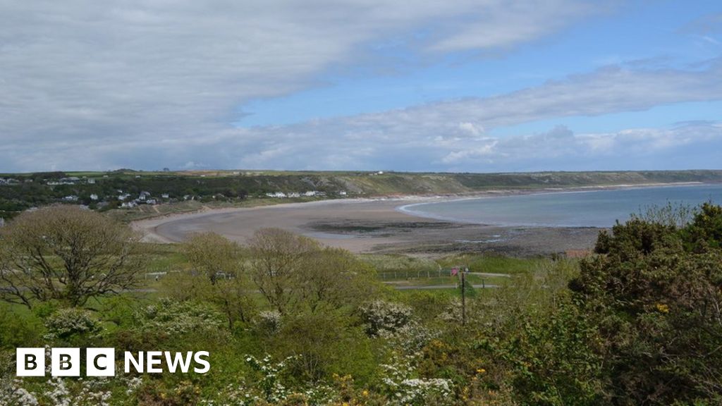 Port Eynon rescue as mum and daughter swept out to sea - BBC News