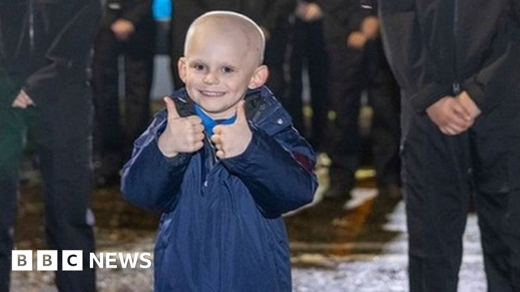 Ethan Adams: Boy fighting cancer made honorary police cadet - BBC News