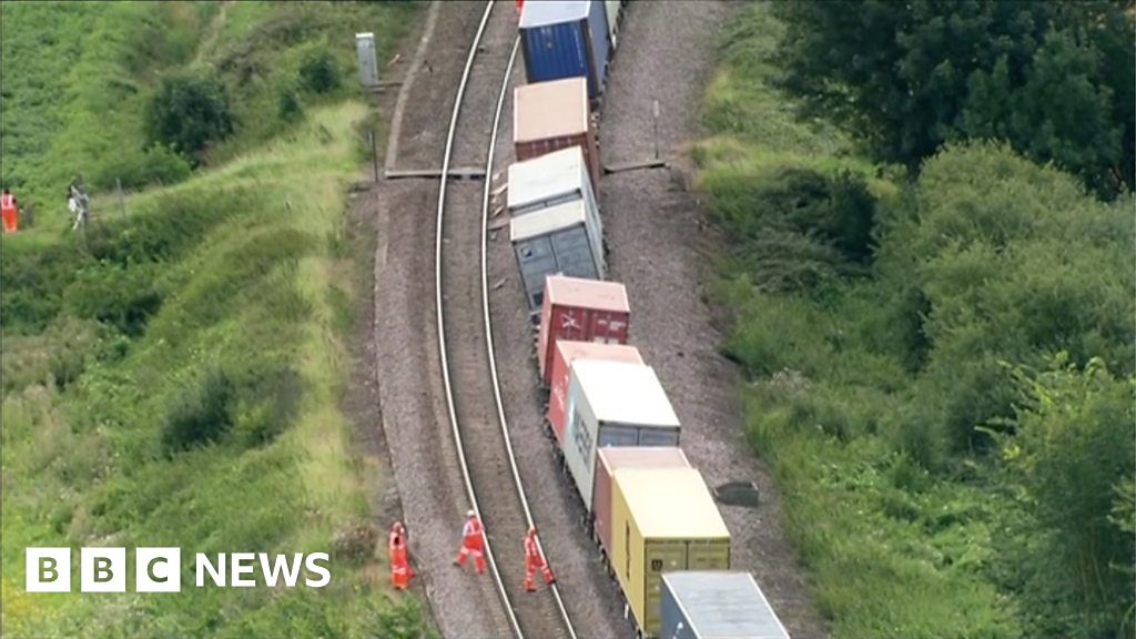 Ely derailed freight train continues to cause chaos - BBC News