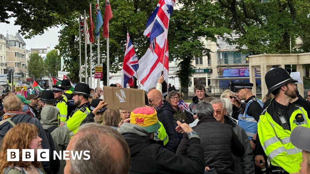 Protest groups separated by Sussex Police in Brighton city centre