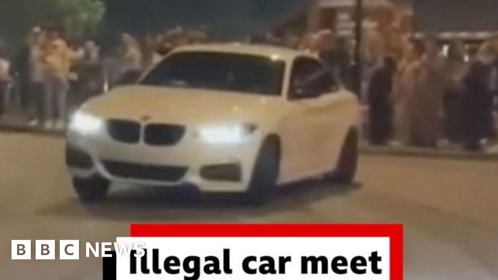 Police footage shows illegal car meet driver drifting on roundabout ...