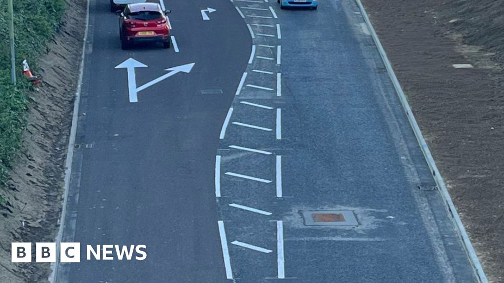 Major road project opens nine years late - BBC News